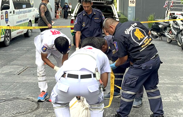 Asian split in two by a 32 story fall from Pattaya building block on ...
