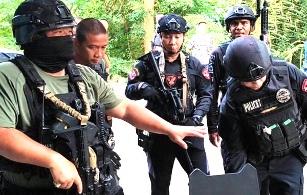 Drug dealer shot dead after fierce gun battle with armed police who ...